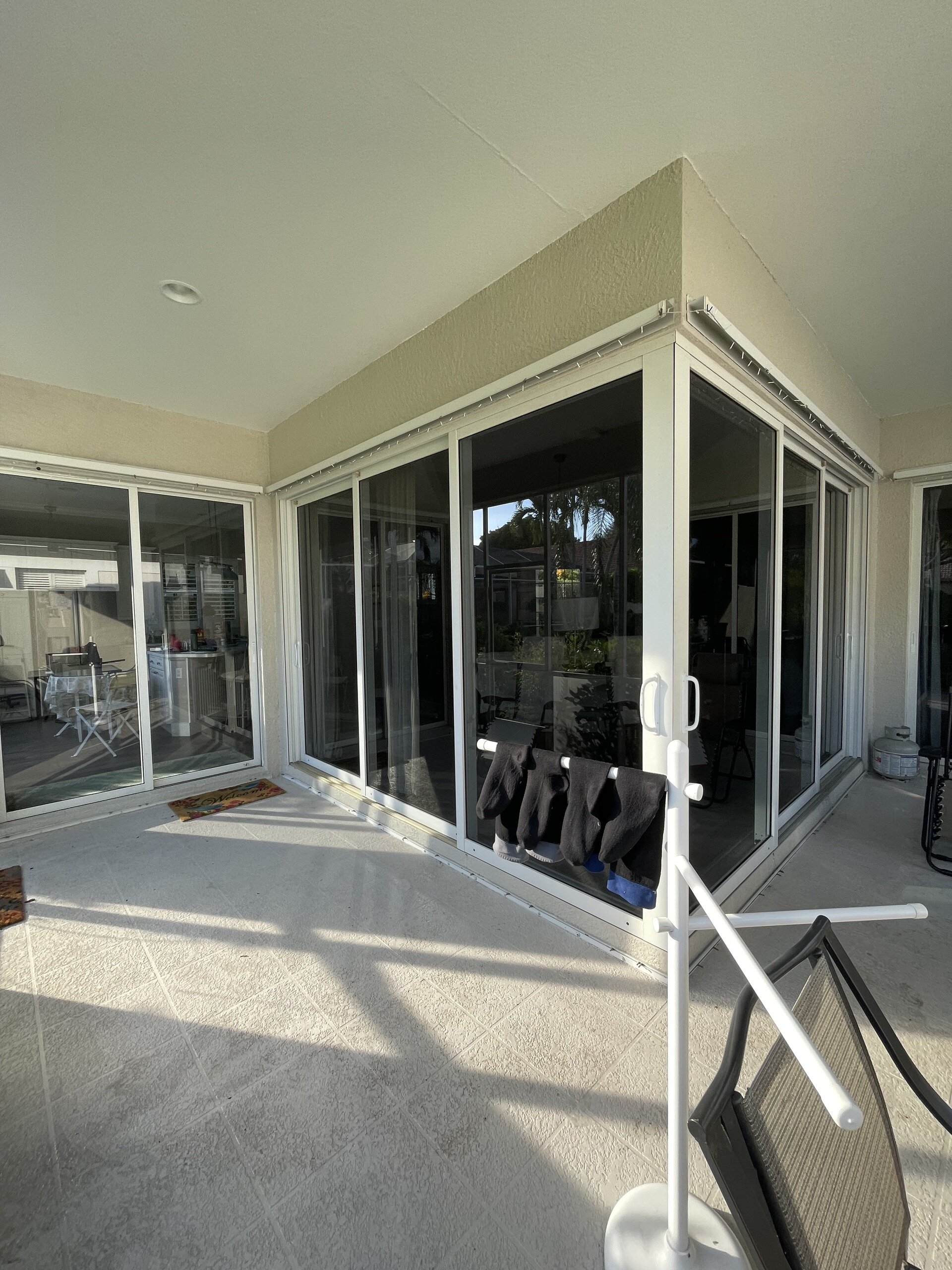 Do Window Cleaners Clean Screens and Tracks in Bella Terra?